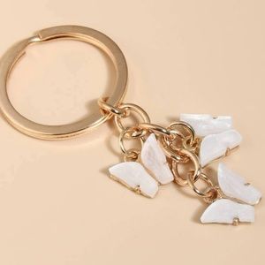 Anthropologie | Accessories | 2 New White Butterfly Pendant Keychain ...